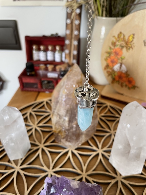 Pendulum Reading | a white feather